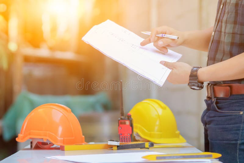 The Engineer is Giving Advice and Consulting with the Designer To Find ...