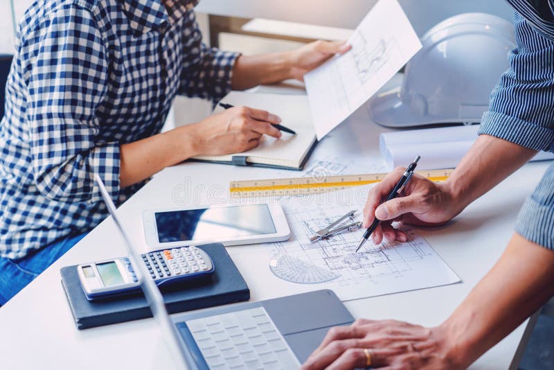 Engineer Hand Drawing Plan on Blue Print with Architect Equipment ...