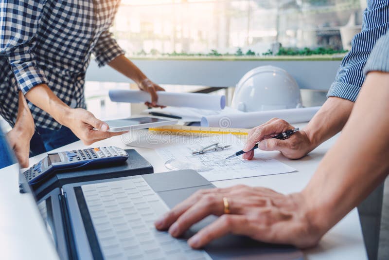 Engineer Hand Drawing Plan on Blue Print with Architect Equipment ...