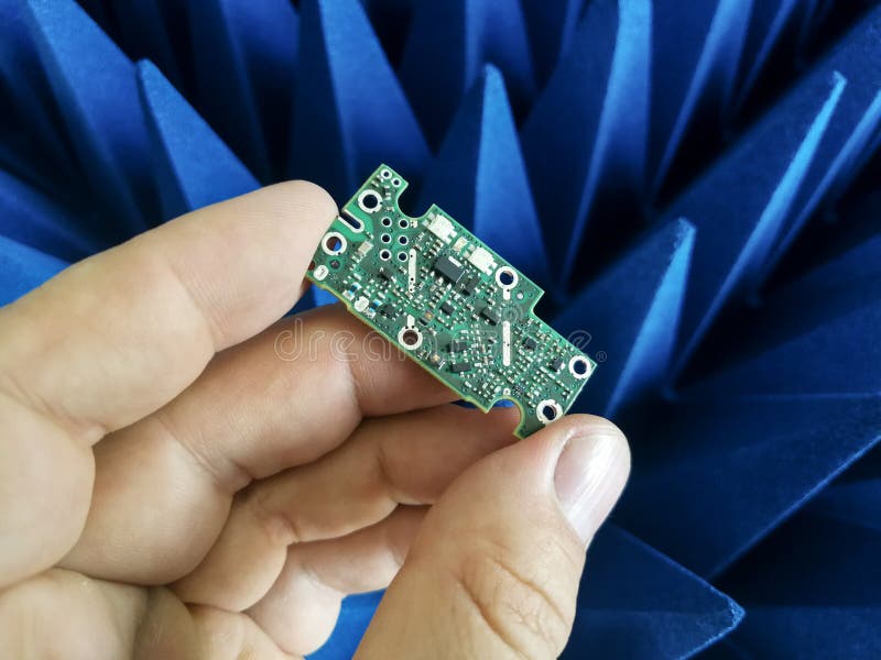 Engineer Hand Holding PCB in Front of EMC Absorbers Stock Image - Image ...
