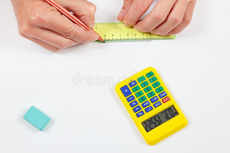 Engineer Hands at Work with a Pencil, Digital Calculator and Ruler ...