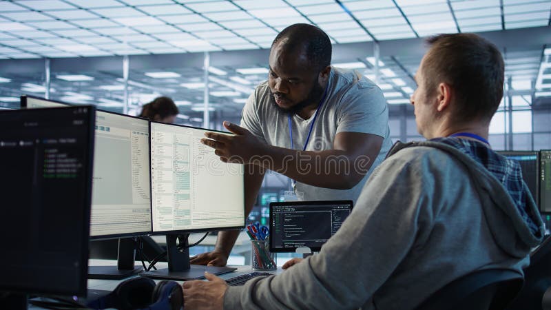 Engineer Having Fun with Colleague at Work in Data Center, Doing Fist ...