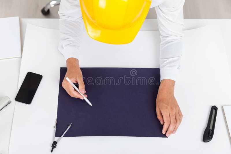 Engineer in Helmet Drawing Blueprint Stock Photo - Image of happiness ...