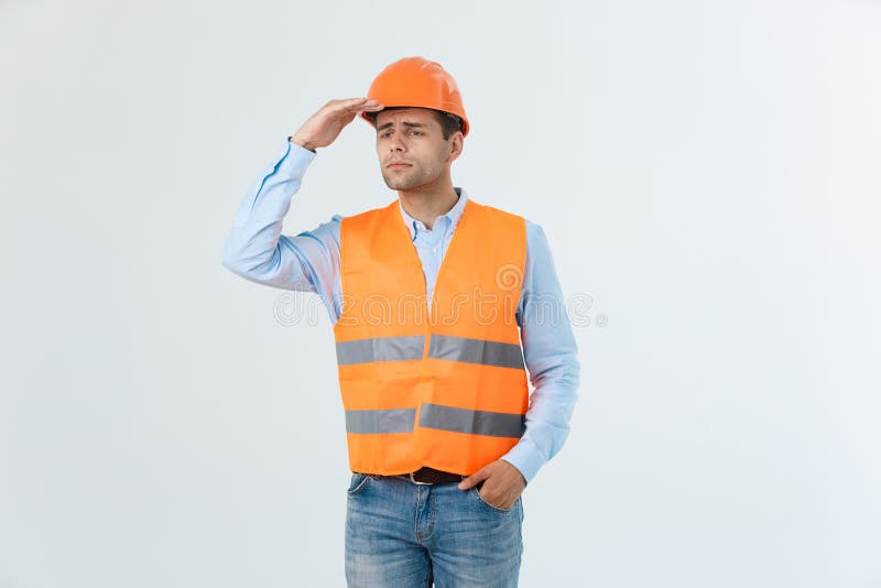 Engineer in a Helmet Looks To the Side View Side View Stock Photo ...