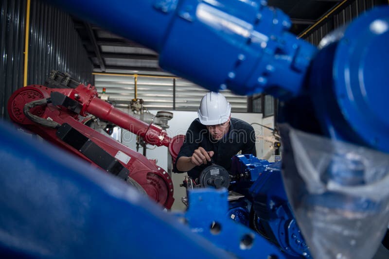 Engineer Inspection Control a Robot Arm Welding Machine with a Remote ...
