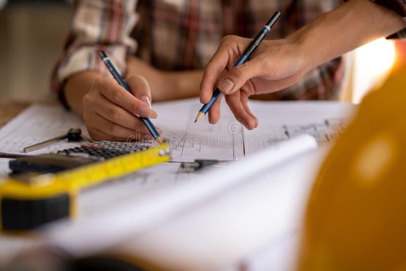 Engineer are Helping To Design Work on Blueprints, Engineer People ...