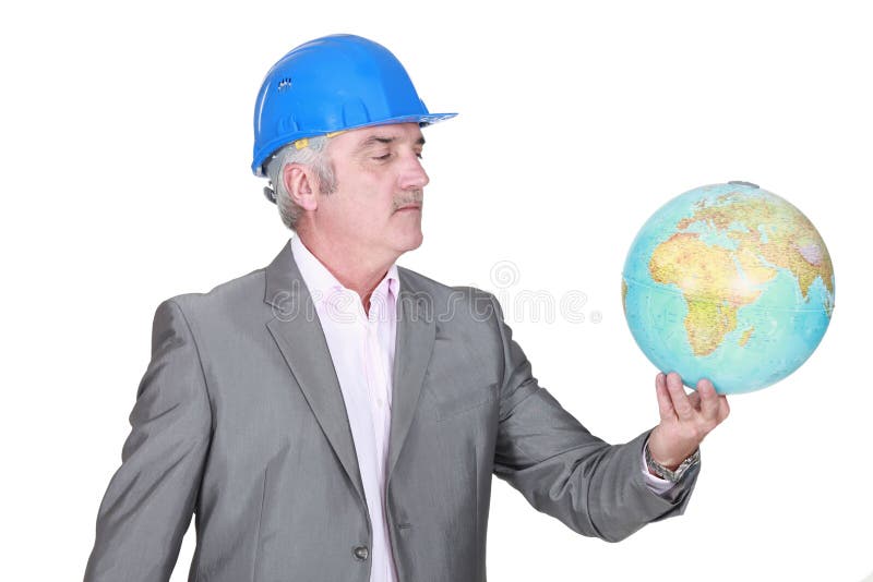 Engineer holding a globe stock photo. Image of build - 31988812