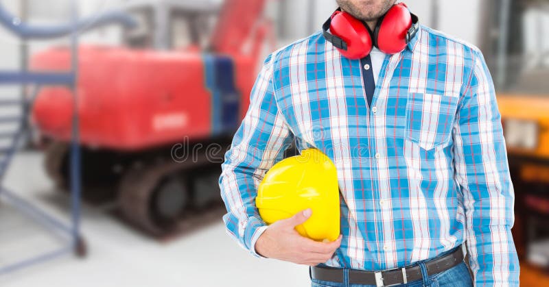 Engineer Holding Hardhat at Construction Site Stock Image - Image of ...