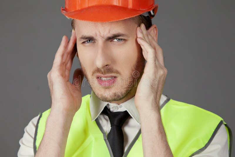 The Young Engineer Holds His Head in His Hands Stock Image - Image of ...