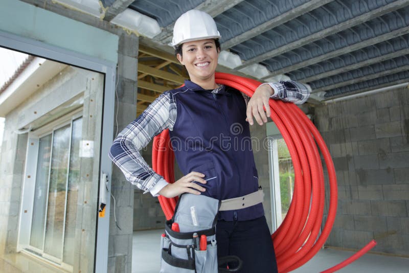 Engineer Holding Pipes in Construction Site Stock Photo - Image of ...