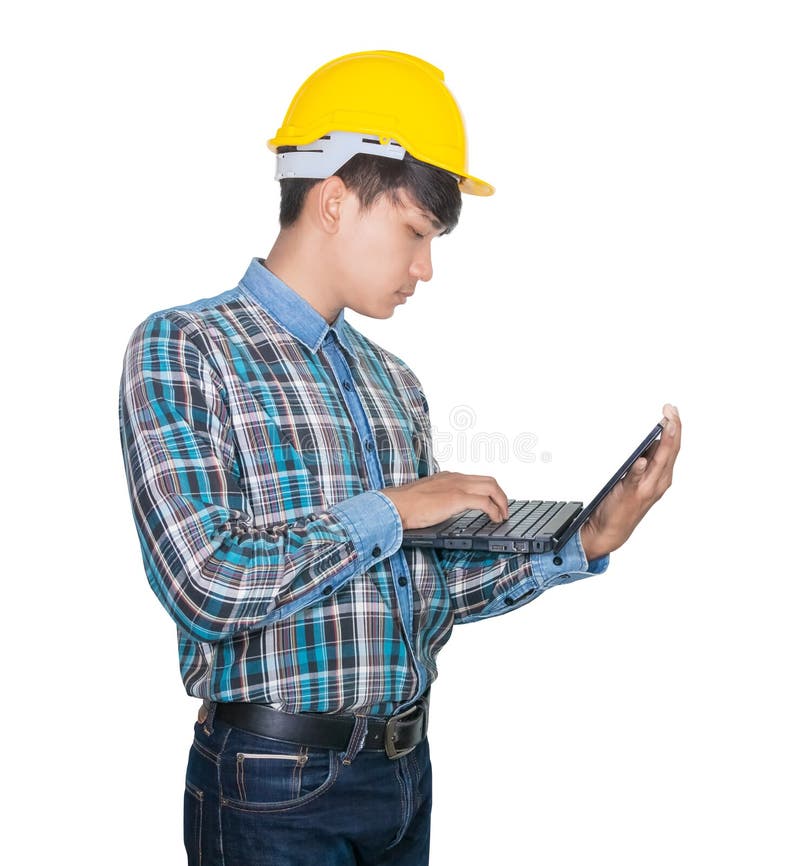 Engineer while Holding Using Laptop and Head Wear Yellow Safety Helmet ...
