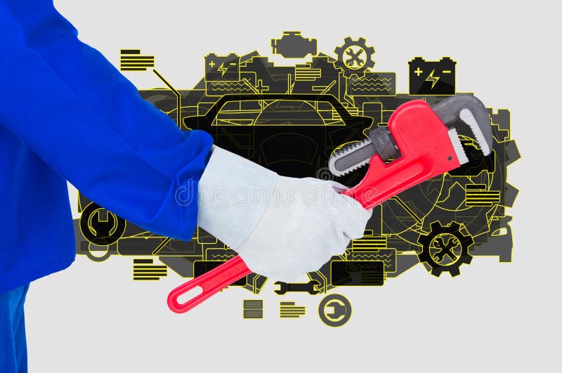 Engineer is Holding a Work Tool Against Mechanic Background Stock Image ...