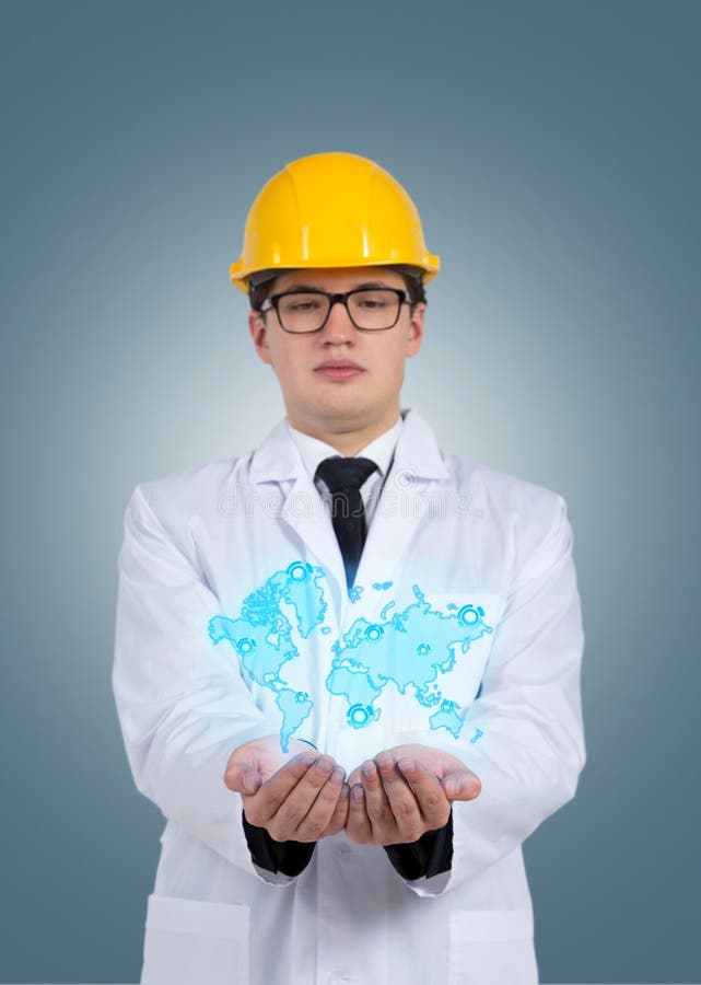 Engineer holding world map stock photo. Image of industrial - 50760930