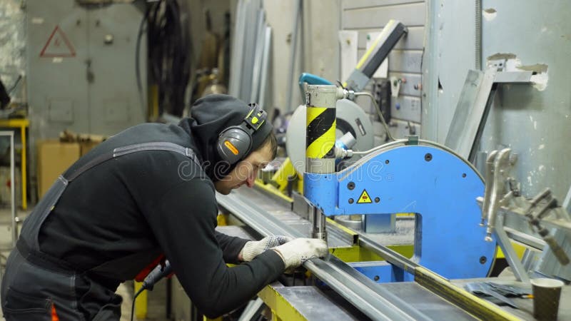 Industrial Factory Securing Metal Profile on Machine for Precise ...