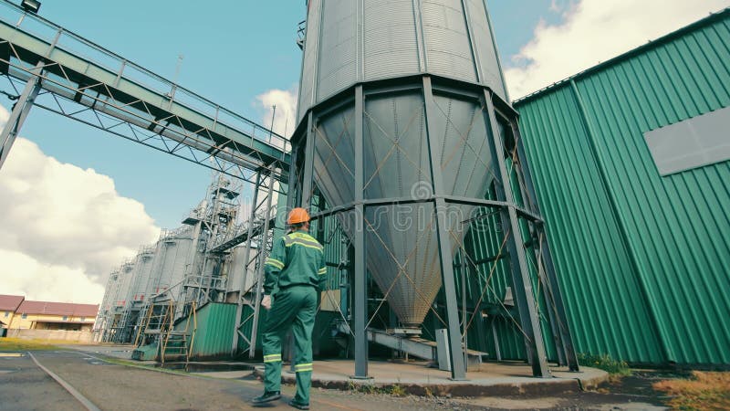 Grain Storage Facility with Metal Structures and Blue Sky. a Modern ...