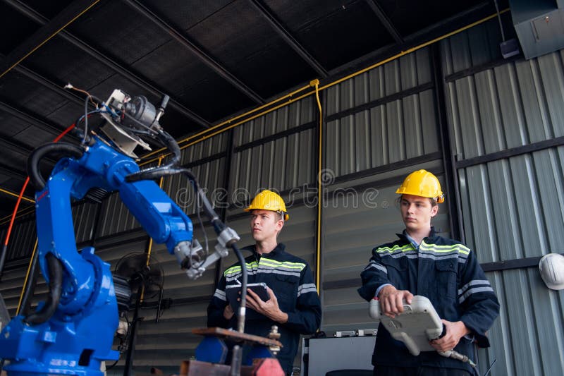 Engineer Inspection Control a Robot Arm Welding Machine with a Remote ...
