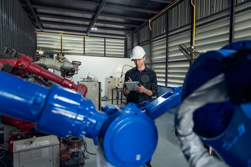 Engineer Inspection Control a Robot Arm Welding Machine with a Remote ...
