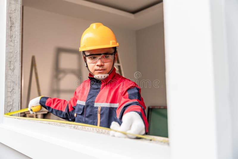 An Engineer or Inspector is Using a Tape Measure To Professionally ...