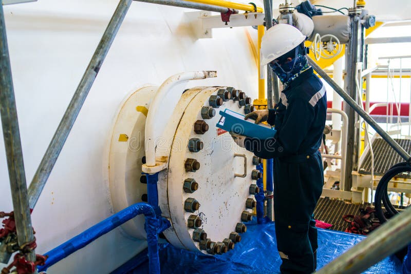 Engineer Inspects Large High Pressure Tanks Stock Photo - Image of duty ...