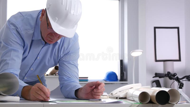 Engineer Job in Office Room Use Adding Machine Calculating Plans and ...