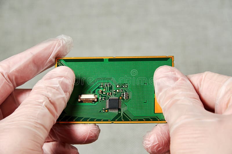 An Engineer Keeps PCB with a Microchip in His Hands after Development ...