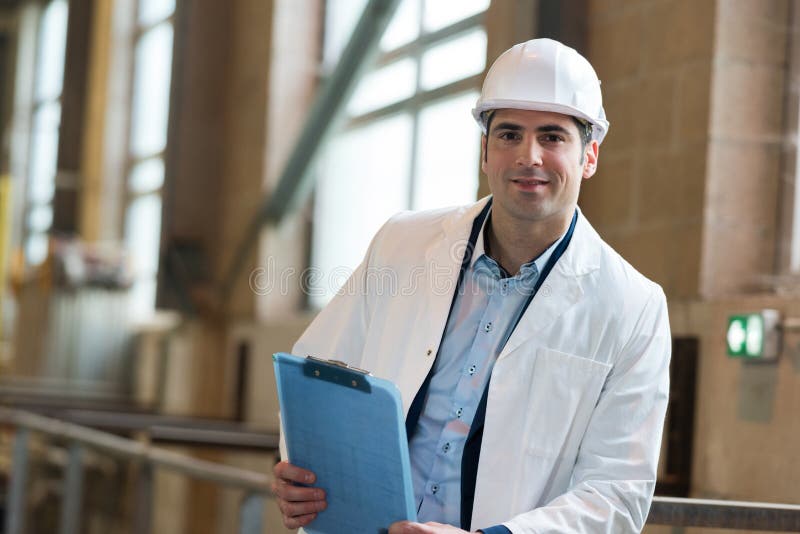 Engineer in Lab Coats Working in Factory Stock Image - Image of ...
