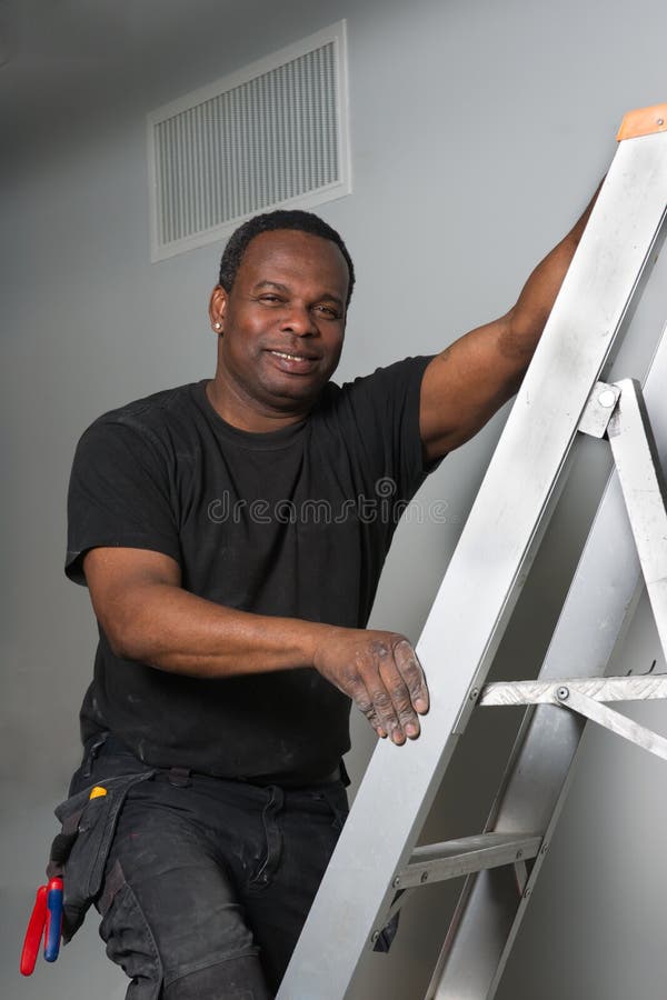 Engineer on a ladder stock photo. Image of gold, male - 21731430