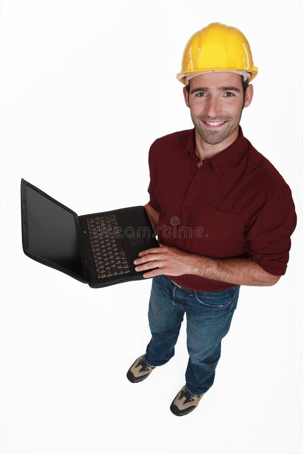 Engineer with a laptop stock photo. Image of employee - 37040602