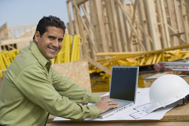 Engineer with Laptop at Construction Site Stock Image - Image of ...