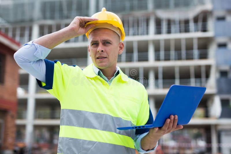 Engineer with Laptop in Construction Site Stock Photo - Image of french ...