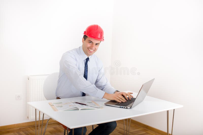Engineer with Laptop in the Office Stock Photo - Image of management ...