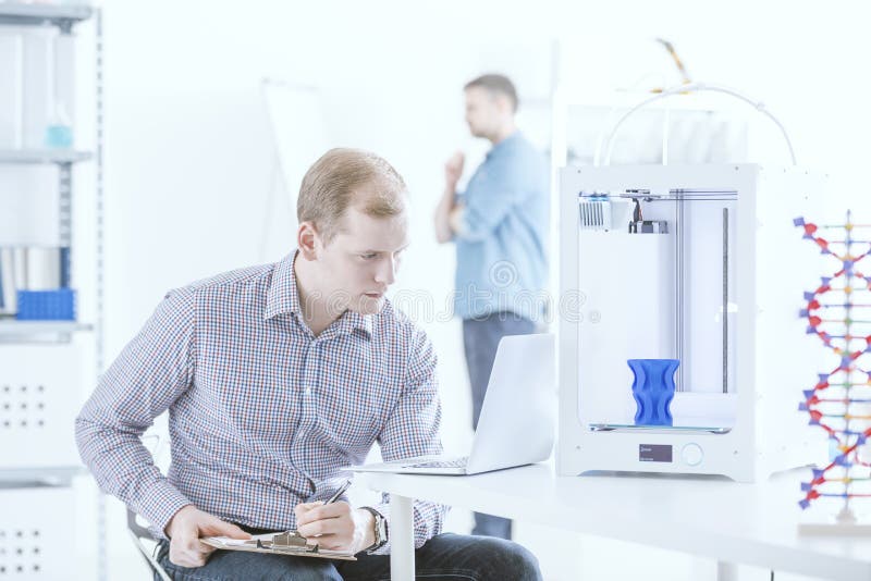 Engineer with Laptop Testing Printer Stock Photo - Image of engineering ...