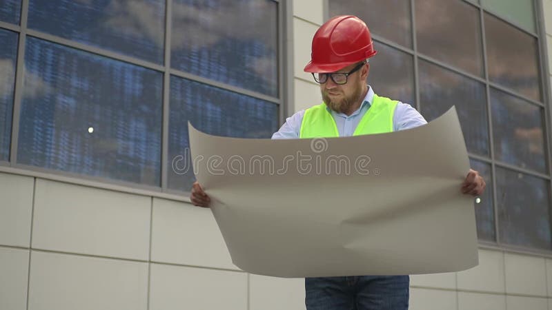 Engineer Looking at Drawing Stock Video - Video of designer, architect ...