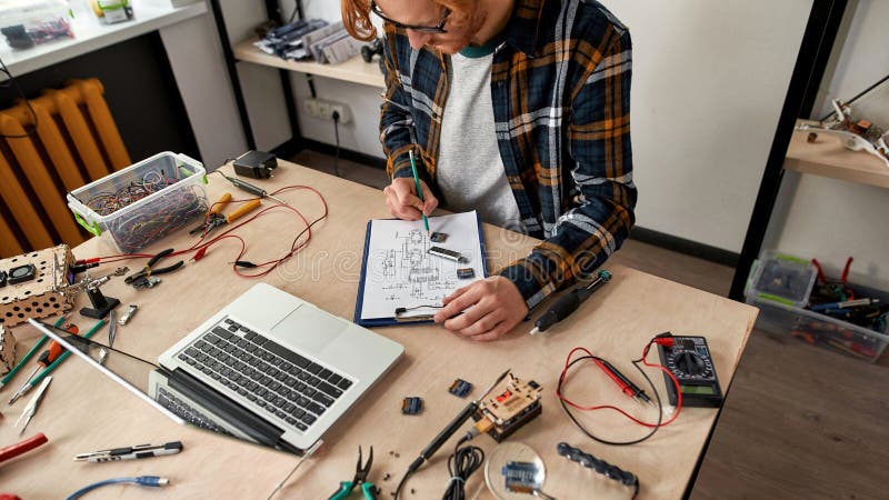 It Engineer Looking and Editing Microchip Scheme Stock Image - Image of ...