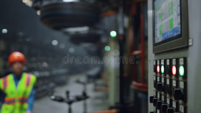 Engineer Looking Machine Screen at Manufacturing Company. Technologies ...