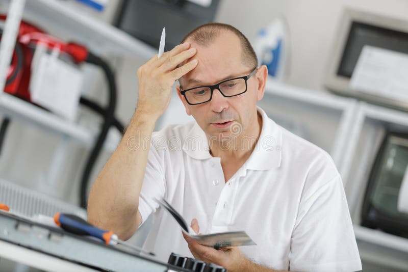 Engineer Looking in Plan Air Conditioning System Stock Image - Image of ...