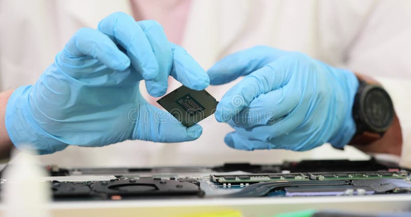 Engineer Looks at Computer Chip through Microscope Stock Video - Video ...