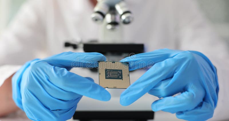 Engineer Looks at Computer Chip through Microscope Stock Video - Video ...