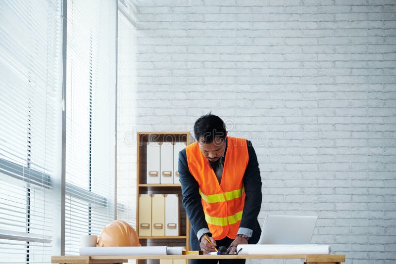 Engineer Making Corrections in Construction Plan Stock Image - Image of ...