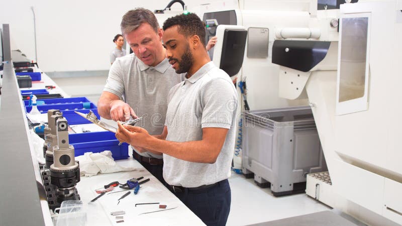 Engineer Male Apprentice Measuring Components Hi Tech Engineering Plant Stock Photos - Free ...