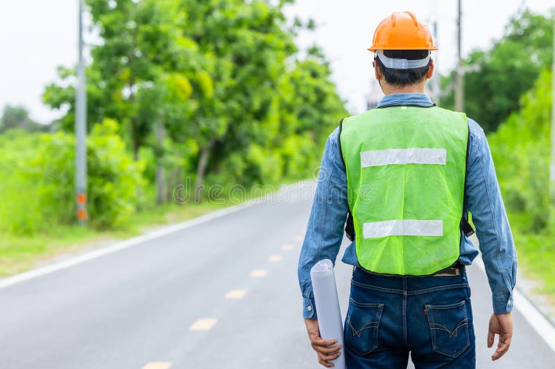 Engineer Male Road Construction Working with Blueprint. Finished ...