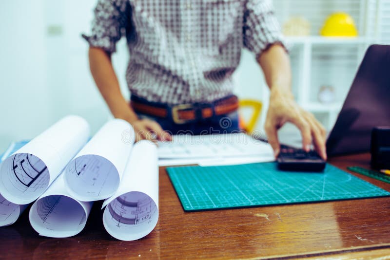 Engineer Man and Architect Drawings Blueprint at Construction Site ...