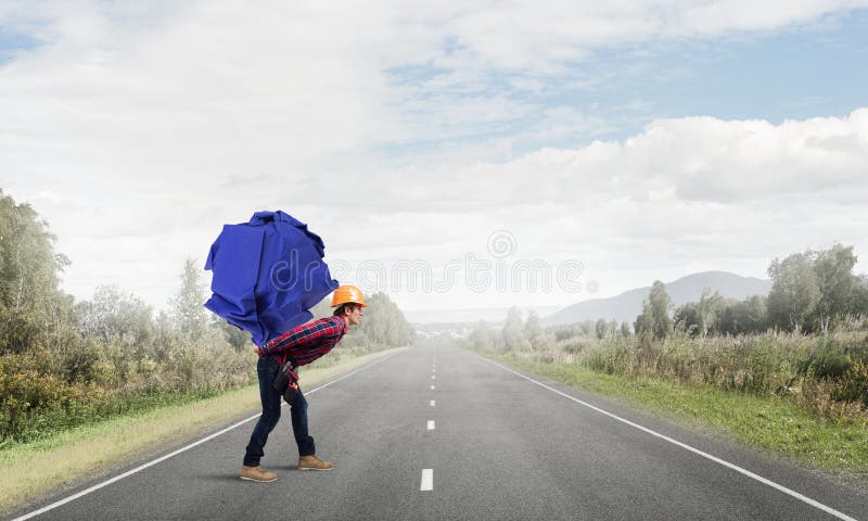 Engineer man carry load stock photo. Image of worker - 275600904