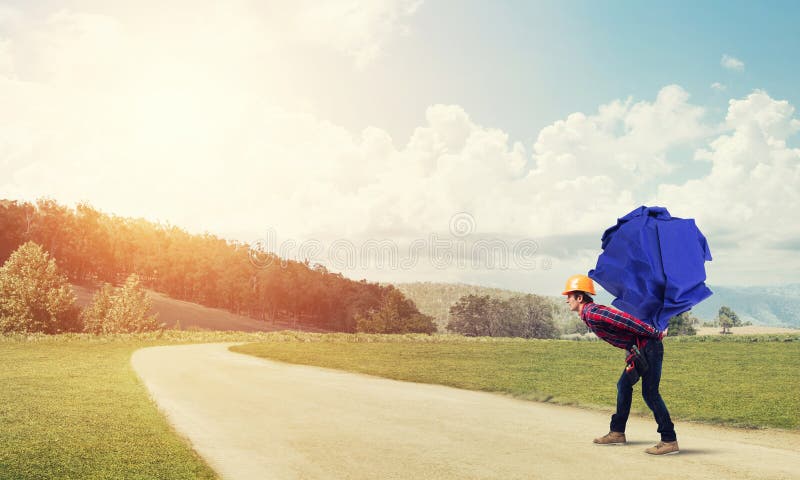 Engineer man carry load stock photo. Image of paper - 281366810