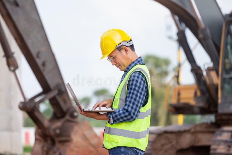 Engineer Man Checking Project at the Building Site, Man in Hardhat with ...