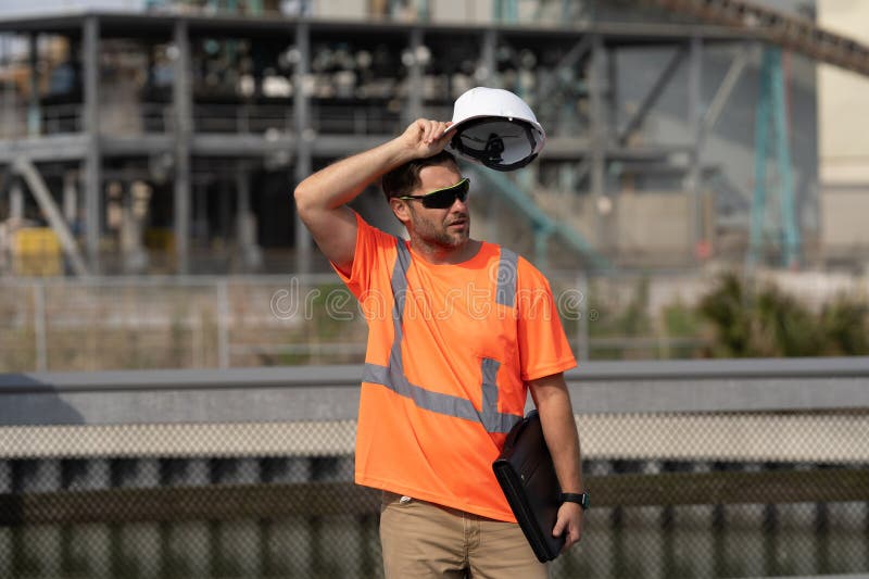 Engineer Man at Construction Site Outdoor. Photo of Engineer Man at ...