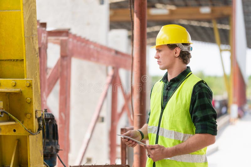 Engineer Man with Digital Tablet Checking Project in the Precast ...