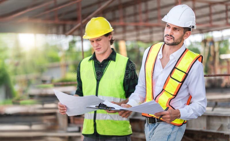 Engineer Man in Hardhat Team Working at Construction Site, Foreman ...