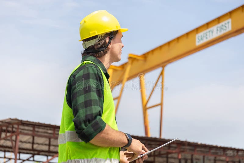 Engineer Man in Hardhats with Tablet on Construction Site, Foreman ...