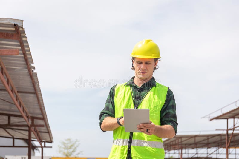 Engineer Man in Hardhats with Tablet on Construction Site, Foreman ...